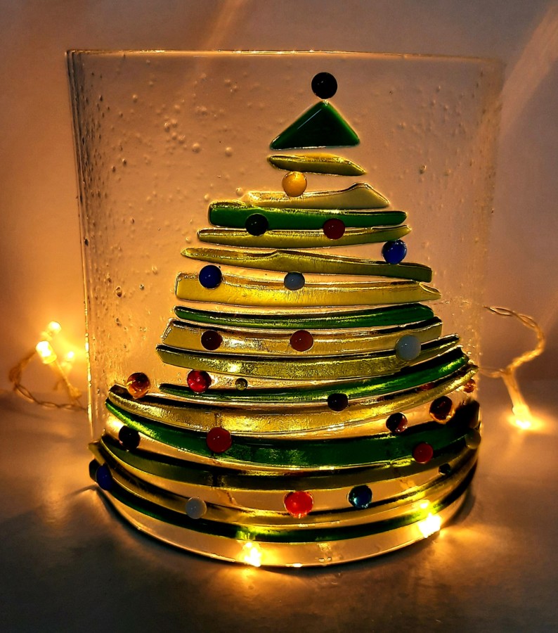 Green Christmas tree candle sconce with coloured decorations | King's ...
