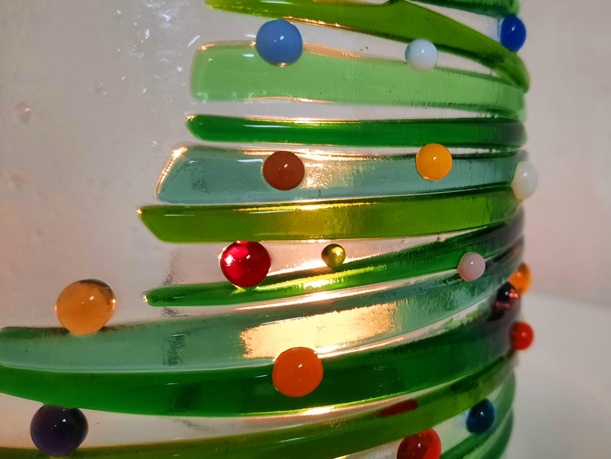 Green Christmas tree candle sconce with coloured decorations | King's ...